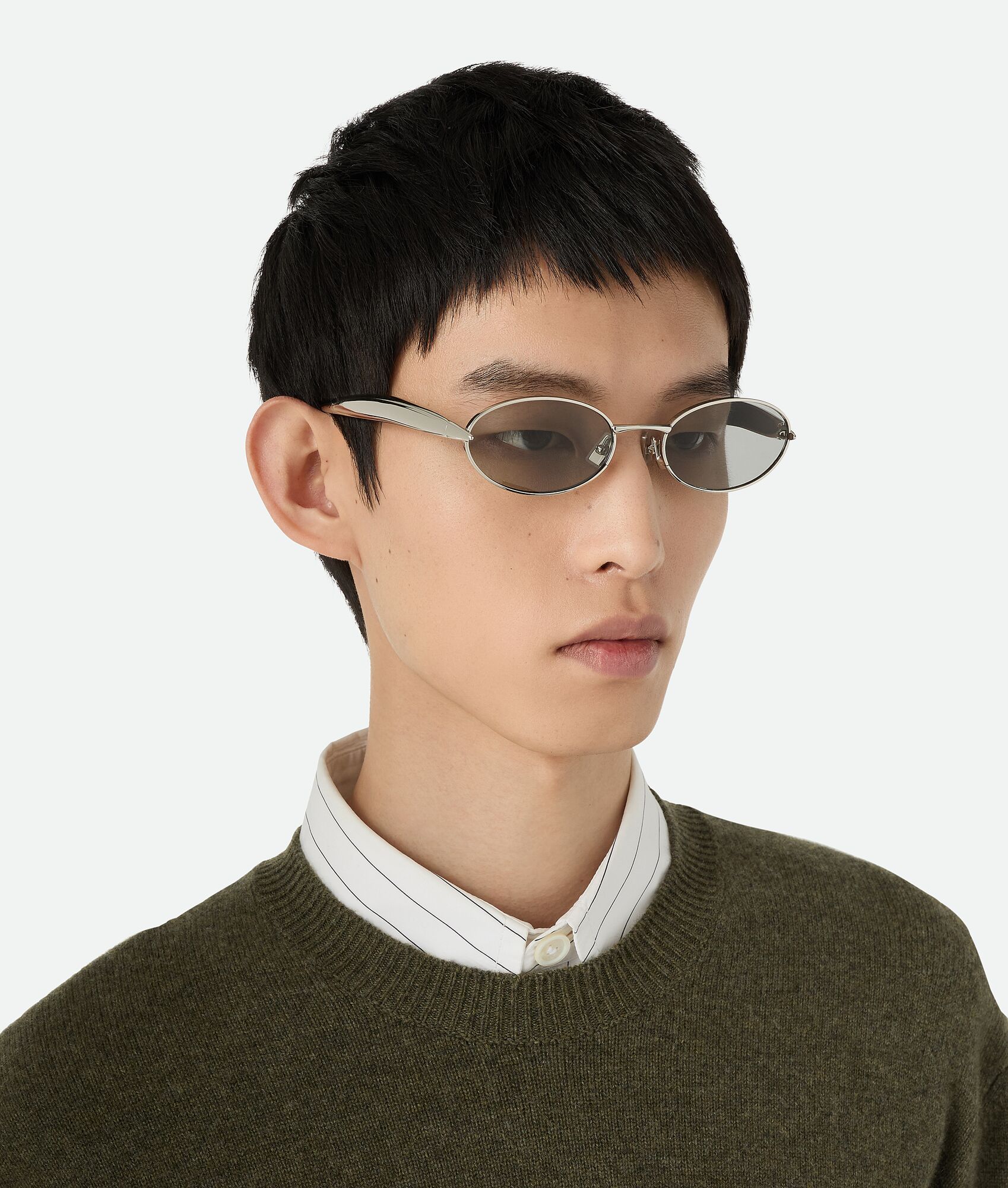 Bottega Veneta® Sardine Oval Sunglasses in Silver/grey. Shop online now.