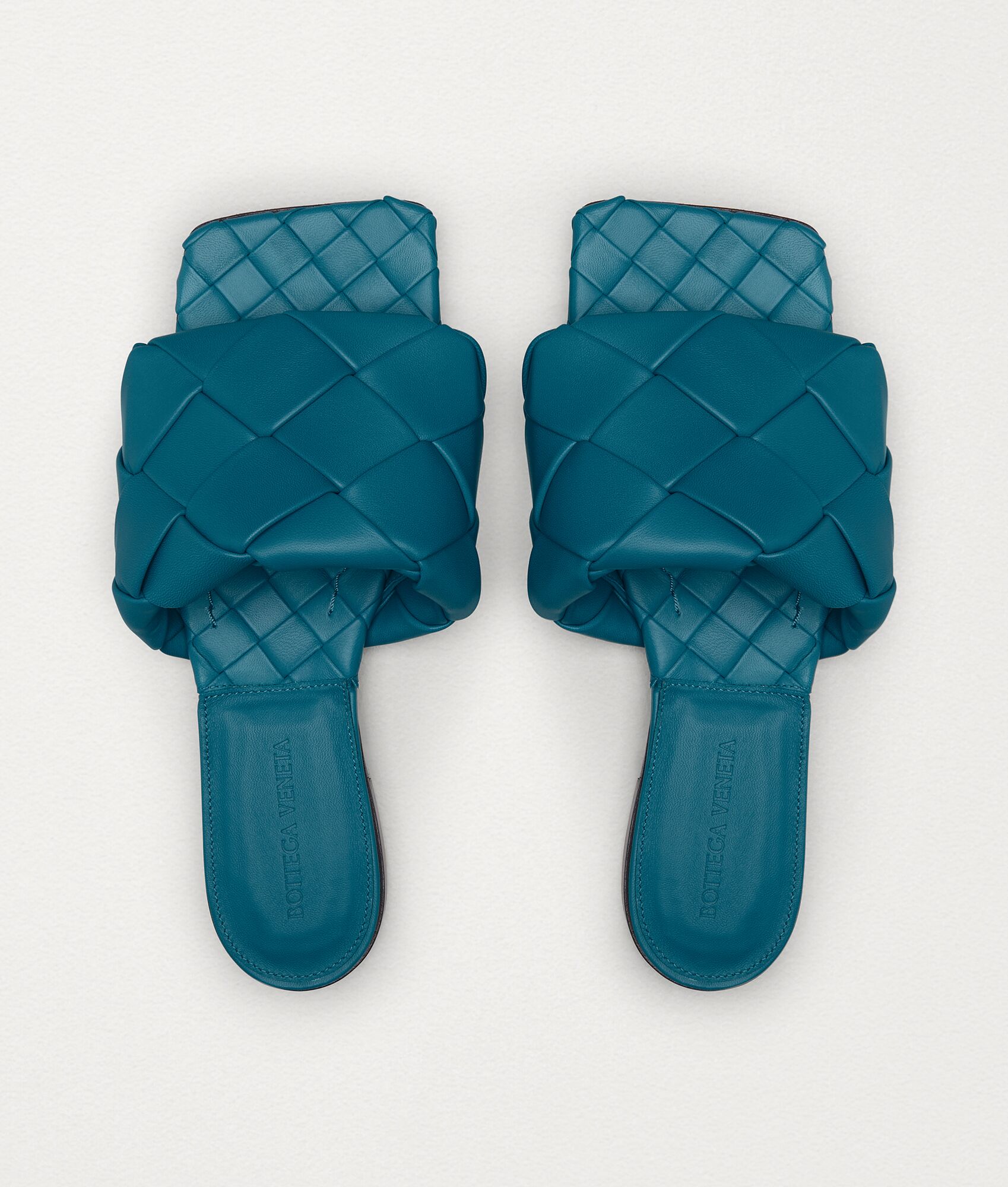 Bottega Veneta® Women's Lido Flat Sandal in Black. Shop online now.